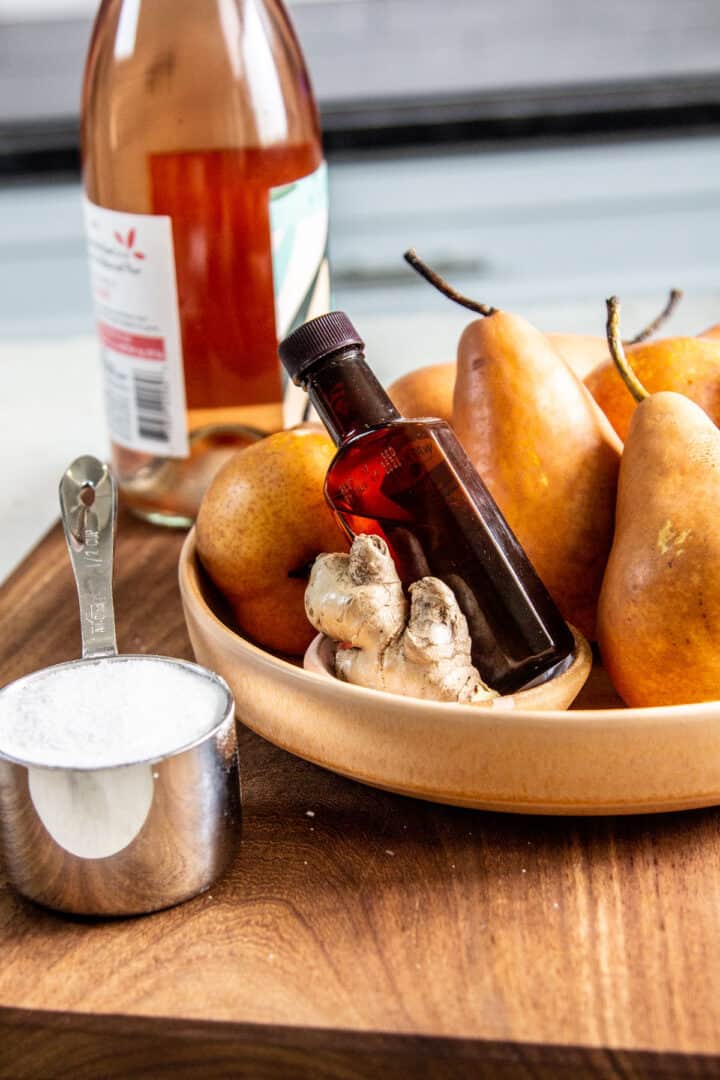 How To Make The Perfect Rosé Poached Pear With Fudge Sauce - This Mess ...
