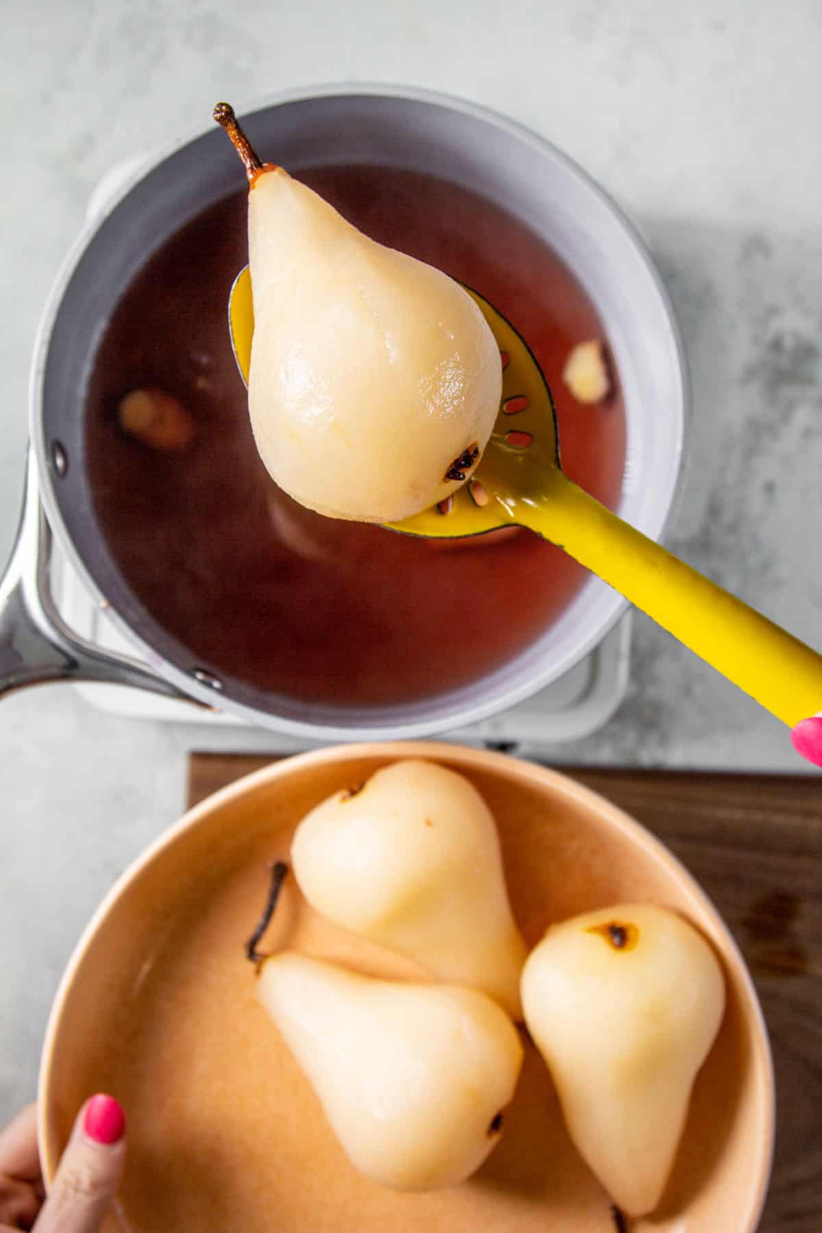 How To Make The Perfect Rosé Poached Pear With Fudge Sauce - This Mess ...